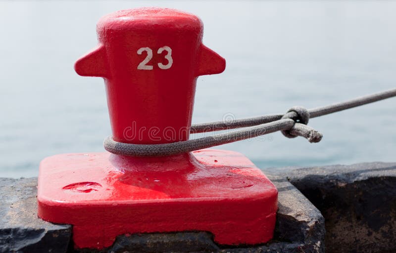 Red Dock Cleat Securing a Ship Stock Photo - Image of lake, rope: 15750664