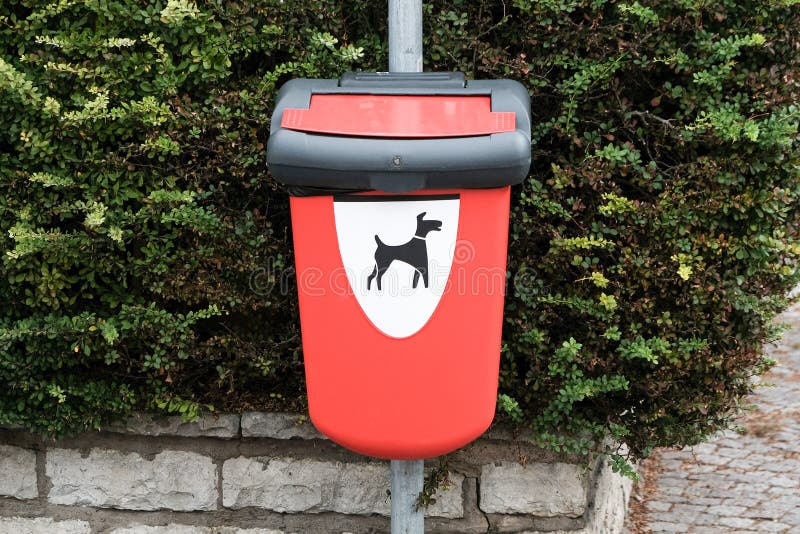 Red dog waste containter stock image. Image of basket - 158121343