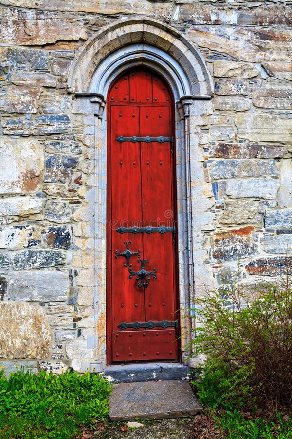 Red Door with Carved Stone Elements in the Frame Stock Image - Image of ...