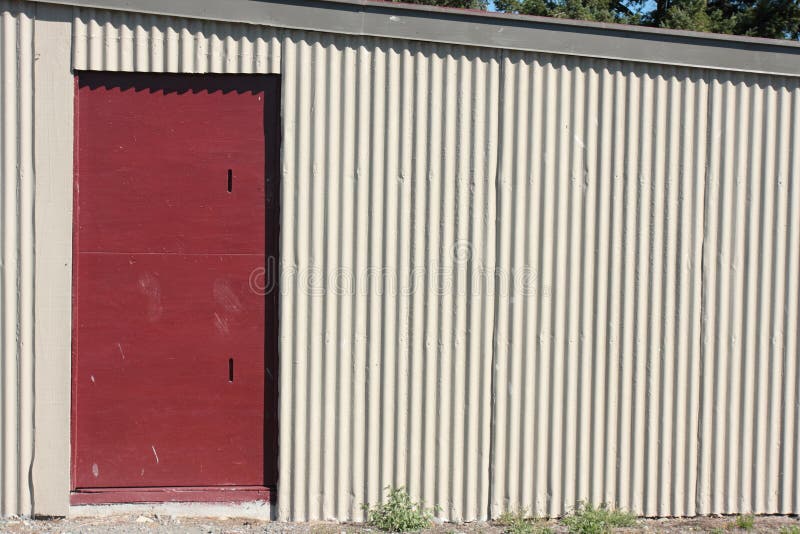 Red Door in Corrugated Iron Shed Stock Photo - Image of building, iron ...