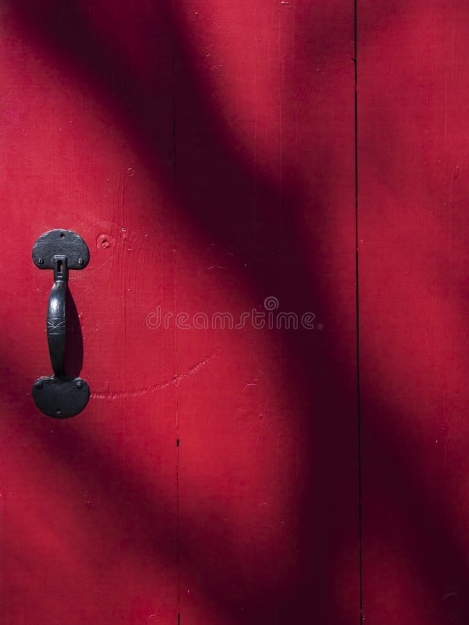 Red door with iron handle stock image. Image of doorway - 88504345