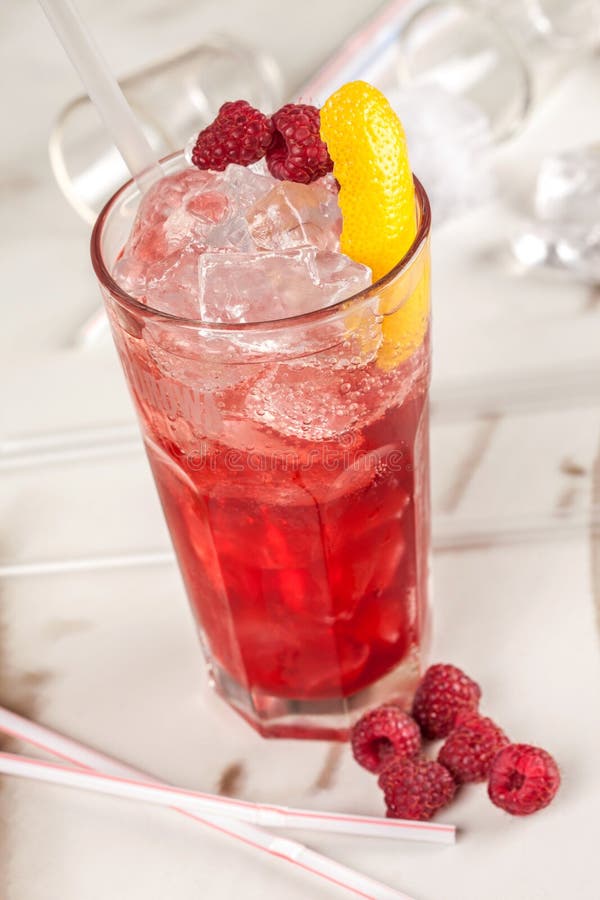 Red drink with raspberries stock image. Image of cocktail - 27930577