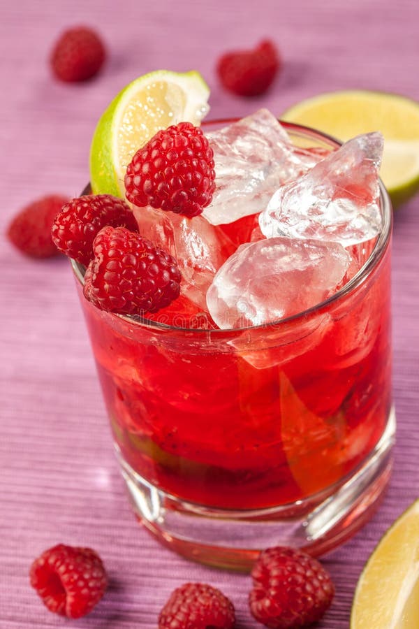 Red drink with raspberries stock image. Image of spirits - 29401897