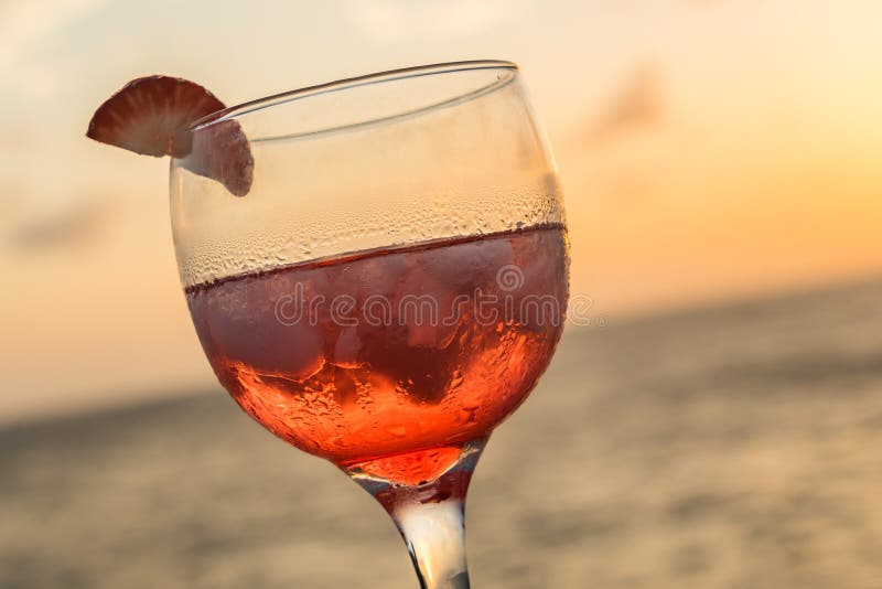 Red Drink at Sunset Curacao Views Stock Image - Image of coast, sunset ...