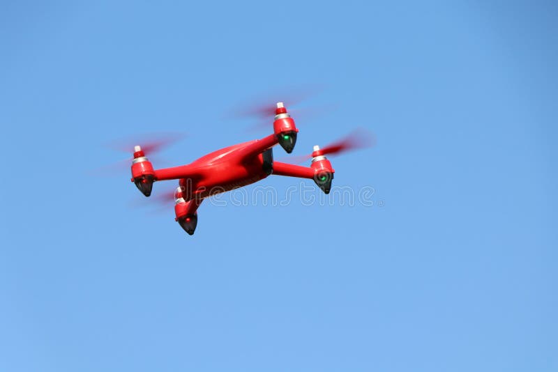 Red Drone on a Blue Background Stock Photo - Image of mountain, blue ...