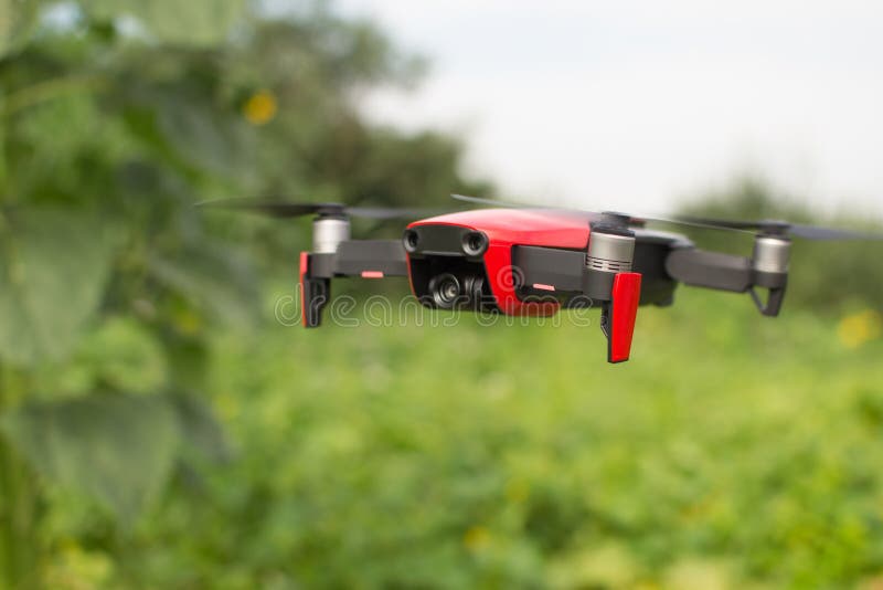 Red Drone Hovering in the Air Stock Photo - Image of illustrative ...