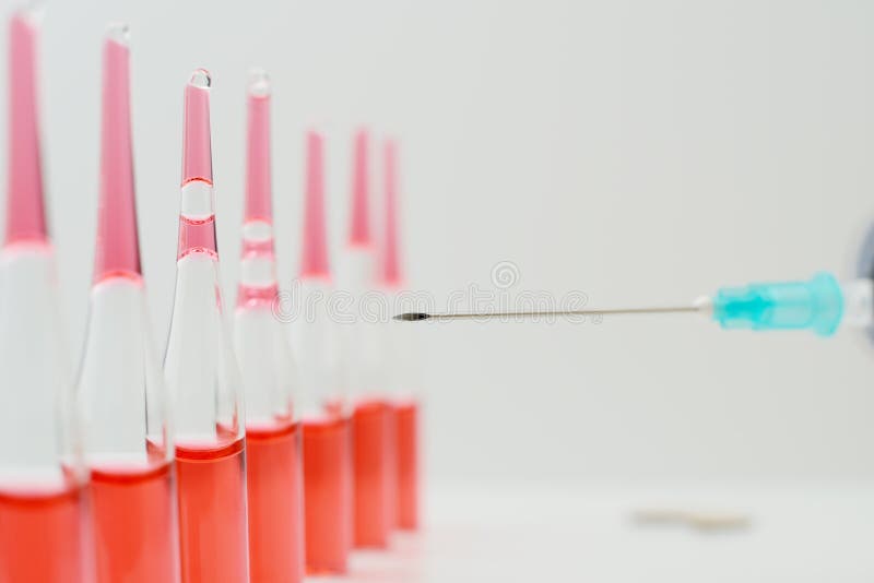 Red drug vials with needle stock photo. Image of ampule - 39394320