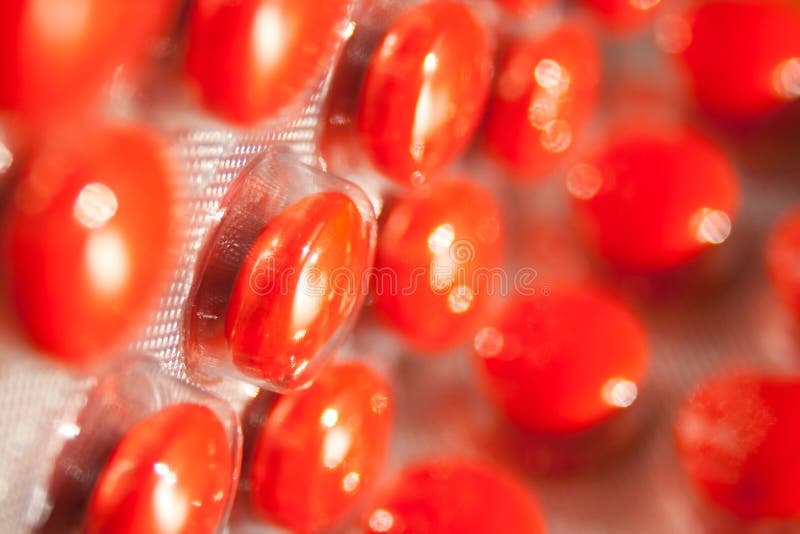 Red drugs on packed stock image. Image of bright, cheerful - 18559045