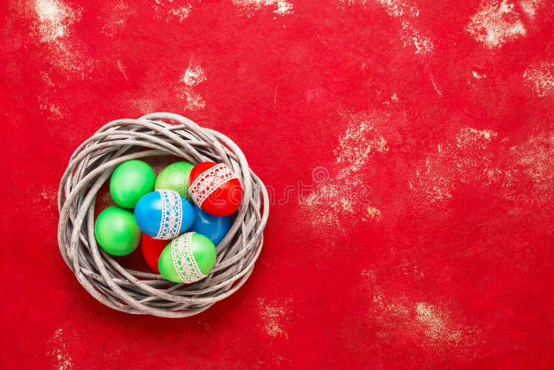 Red Easter Background. Colorful Easter Eggs in Wreath on Red Background ...