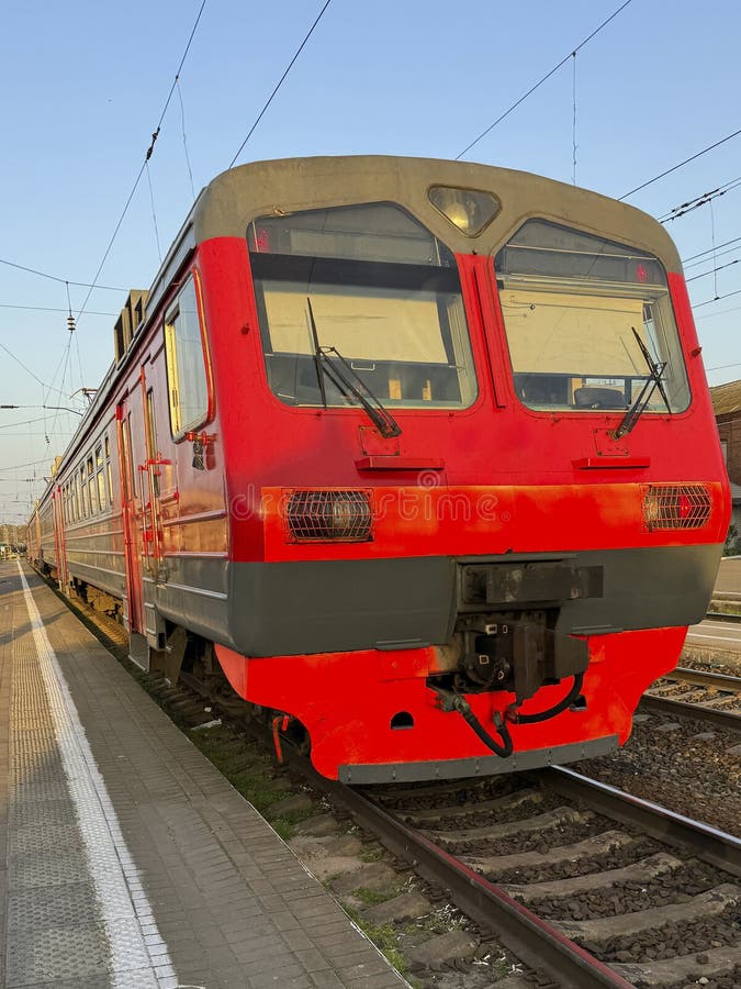 Red Electric Train at a Stop on the Railway Stock Image - Image of city ...