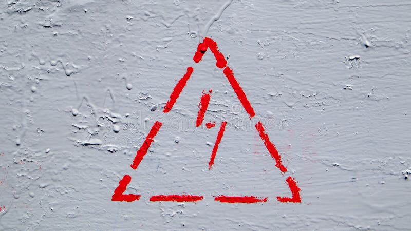 Red Electrical Hazard Sign with Lightning in a Triangle on a Gray ...