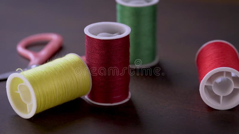 Red Elegance: the Graceful Motion of a Silk Thread Bobbin Stock Footage ...