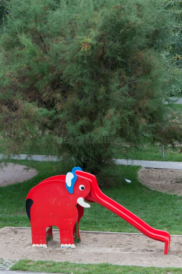 Red elephant slide stock photo. Image of land, nature - 45718730