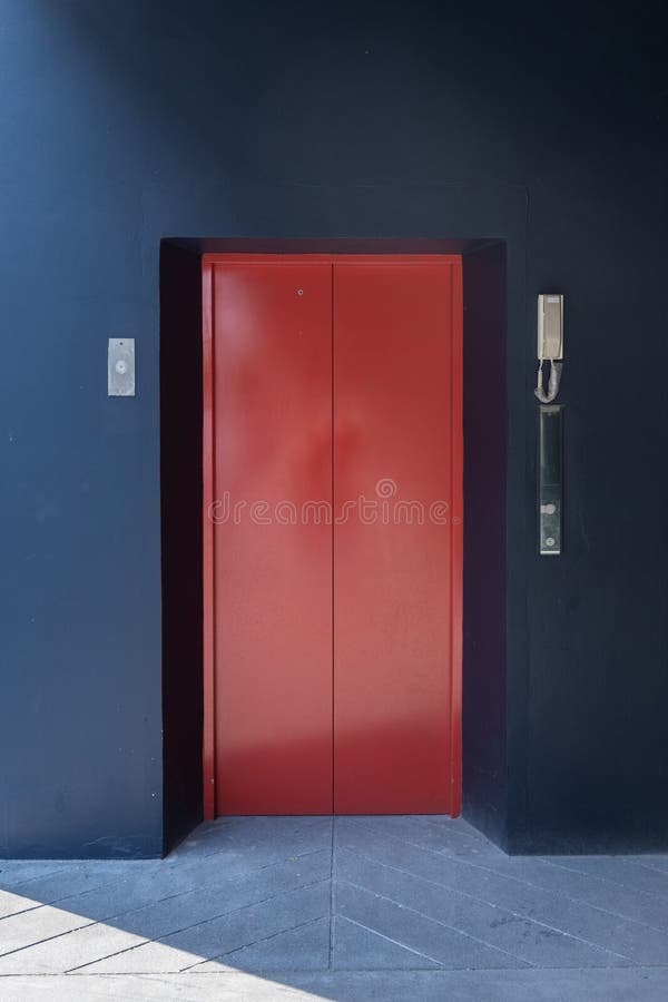 Red Elevator and Black Wall with Telephone Stock Image - Image of floor ...