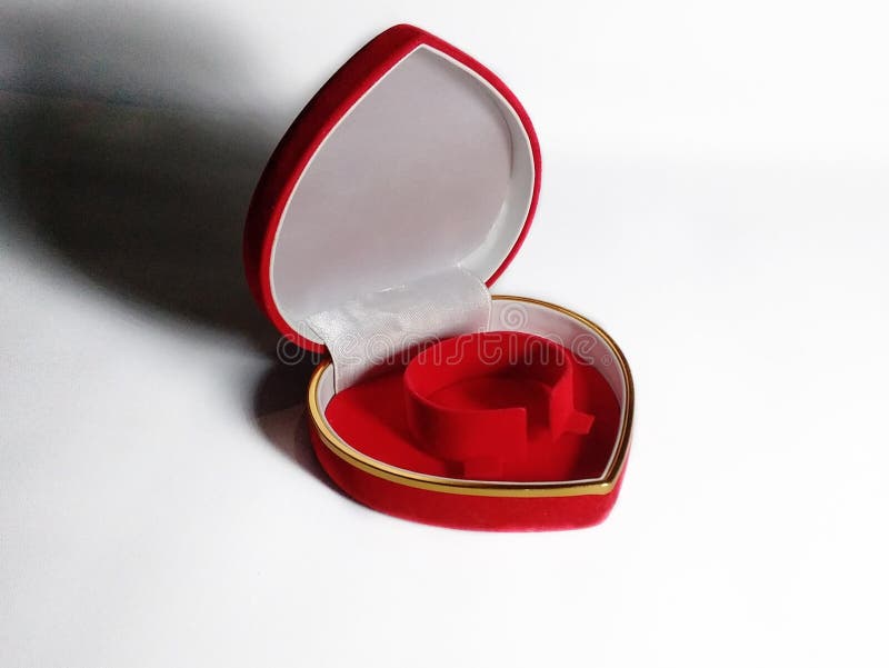 Red Empty Bracelet Jewelry Box in the Shape of a Heart Stock Photo ...