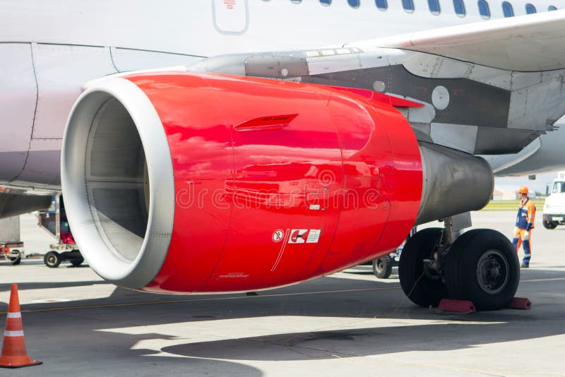Red Engine of a Passenger Aircraft Stock Photo - Image of airliner ...