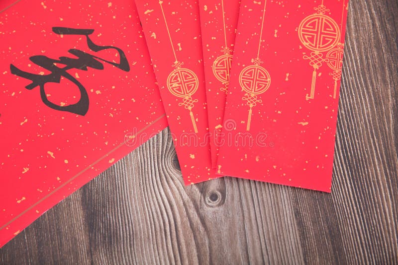 Red Envelopes and Spring Festival Couplets on the Table Stock Image ...