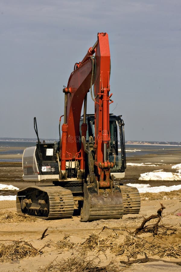 Red Excavator on Winter Beach Stock Image - Image of snow, sand: 50187587