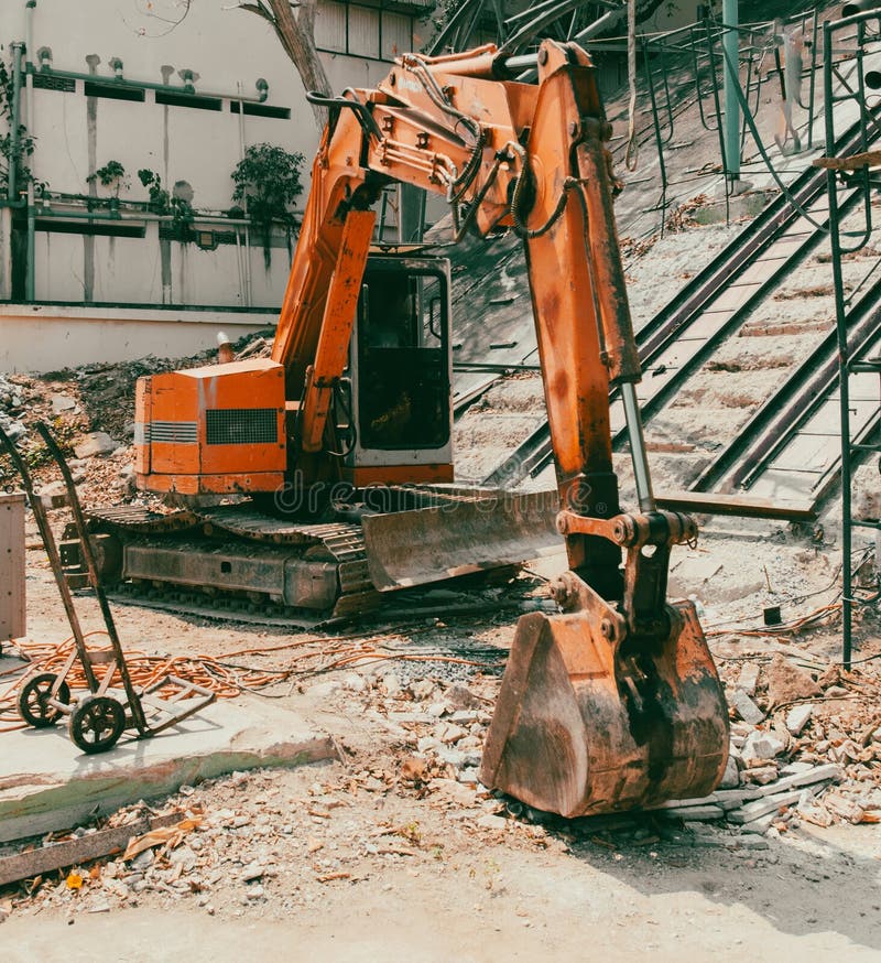 A Red Excavator Works at a Construction Site Stock Photo - Image of ...