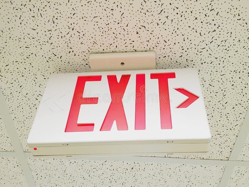 Red exit sign on ceiling stock photo. Image of advertising - 215018504