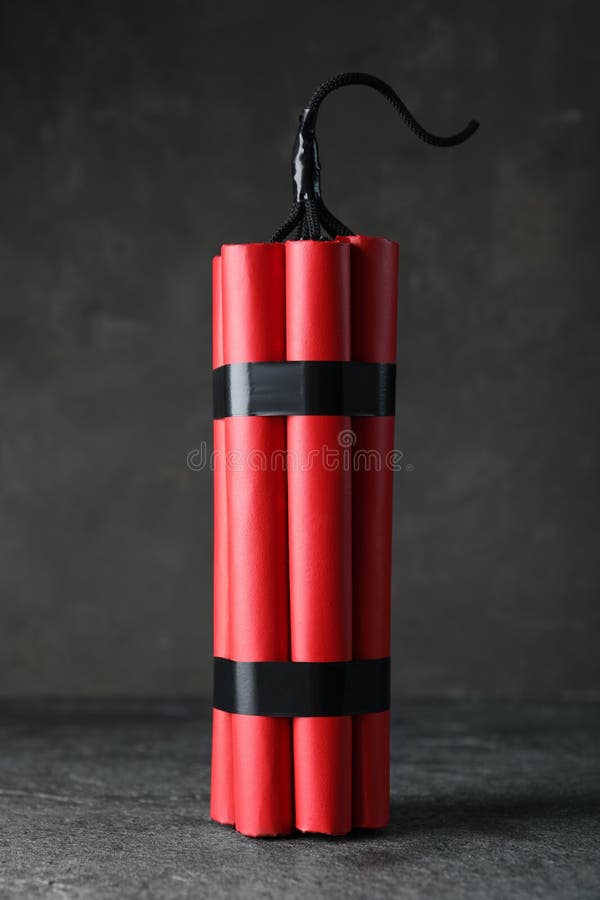 Red Explosive Dynamite Bomb on Grey Table Stock Photo - Image of fuse ...