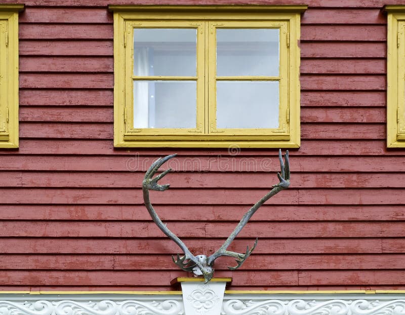 Red Facade with Yellow Windows Stock Image - Image of yellow, detail ...