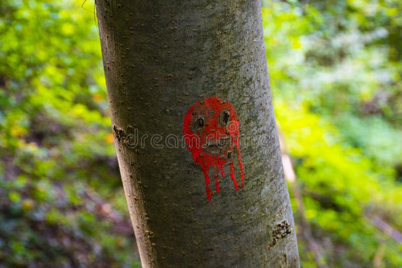 Red Face in a Green Tree One Stock Photo - Image of ghost, halloween ...