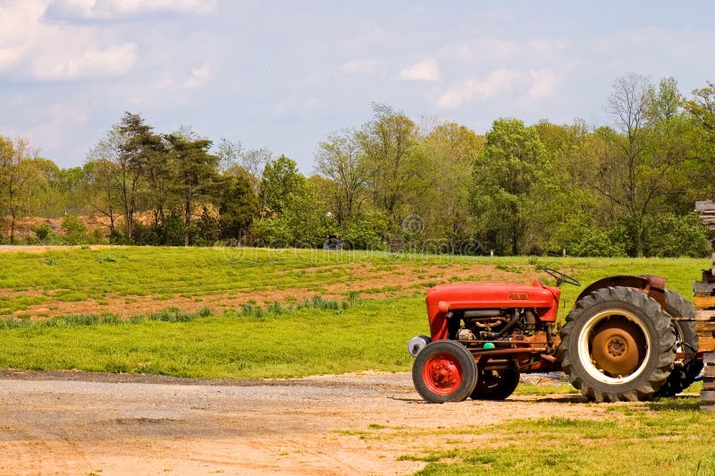 Red Farm Tractor Near Field Stock Photo - Image of farm, growing: 2334618