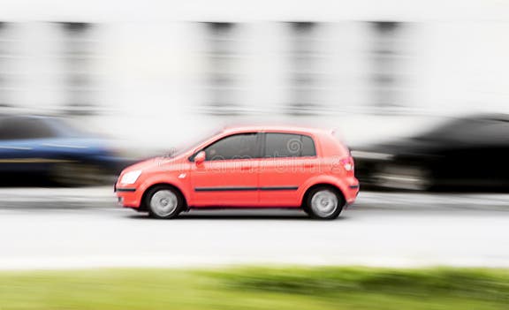 Red fast car stock image. Image of luxury, beauty, detail - 13932855