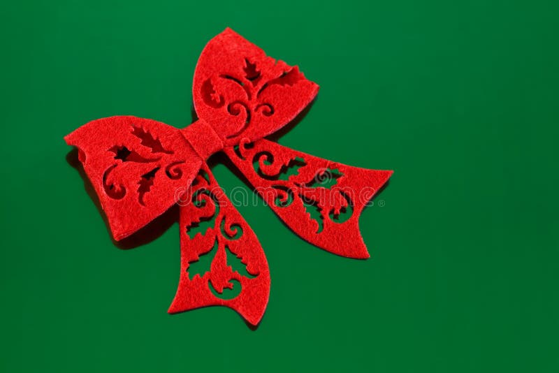 Red Felt Bow on Green stock photo. Image of christmas - 30365642