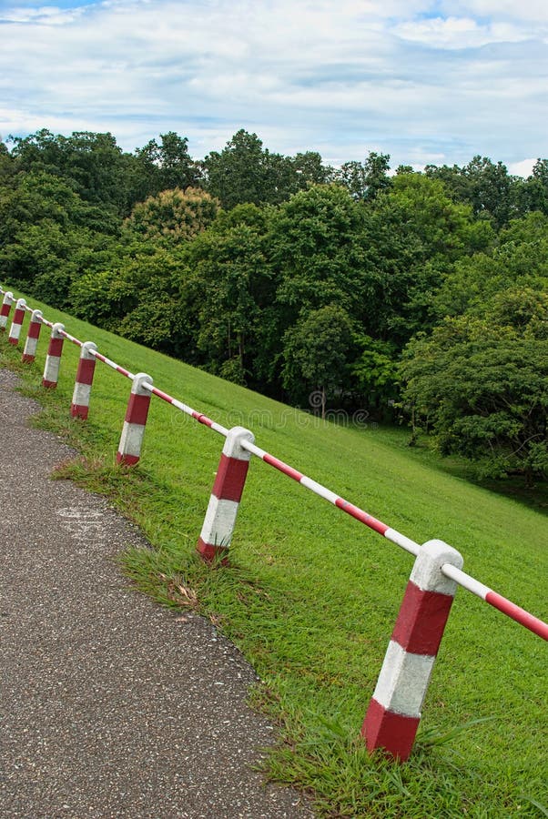 Red fence and the garden stock photo. Image of space - 43289024