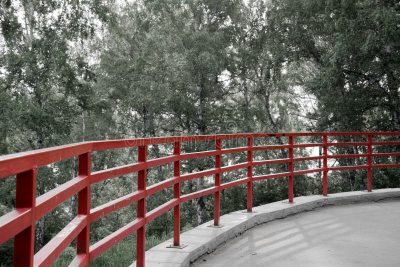 Red fence on the park stock image. Image of iron, blue - 74913547