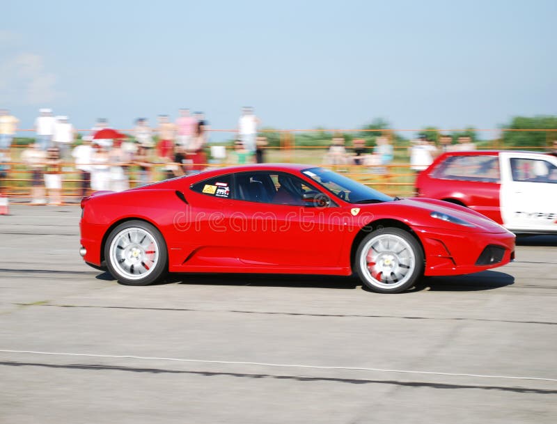Red Ferrari editorial stock photo. Image of acceleration - 15064923