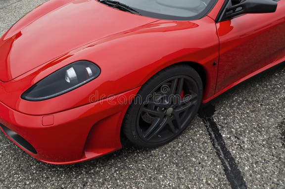 898 Asphalt Red Ferrari Stock Photos - Free & Royalty-Free Stock Photos ...