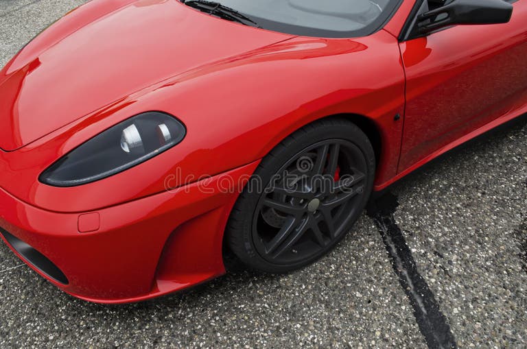 898 Asphalt Red Ferrari Stock Photos - Free & Royalty-Free Stock Photos ...