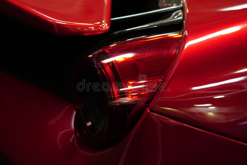 Red Ferrari backlight stock image. Image of bumper, sedan - 266646605