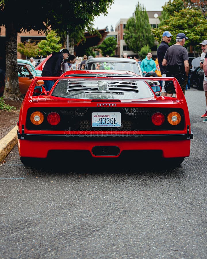 Red Ferrari F40 in street editorial stock photo. Image of vertical ...