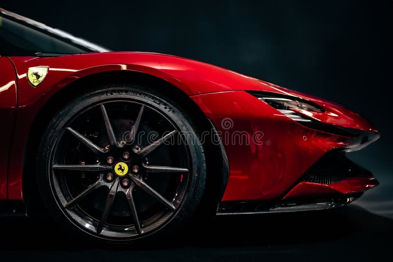 Red Ferrari SF90 Stradale Side Illuminated in Darkness with Headlights ...
