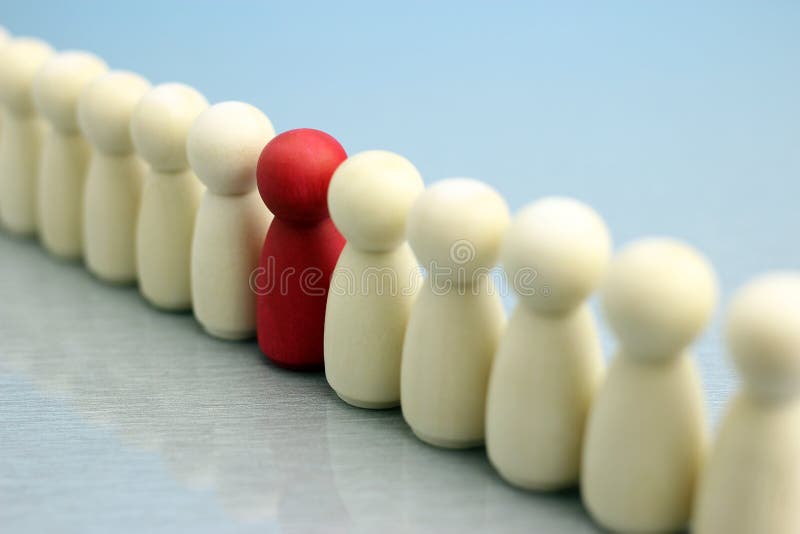 Red Figurine Stand Out from the Crowd in the Line, the Symbol of ...