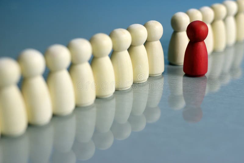 Red Figurine Stand Out from the Crowd in the Line, the Symbol of ...