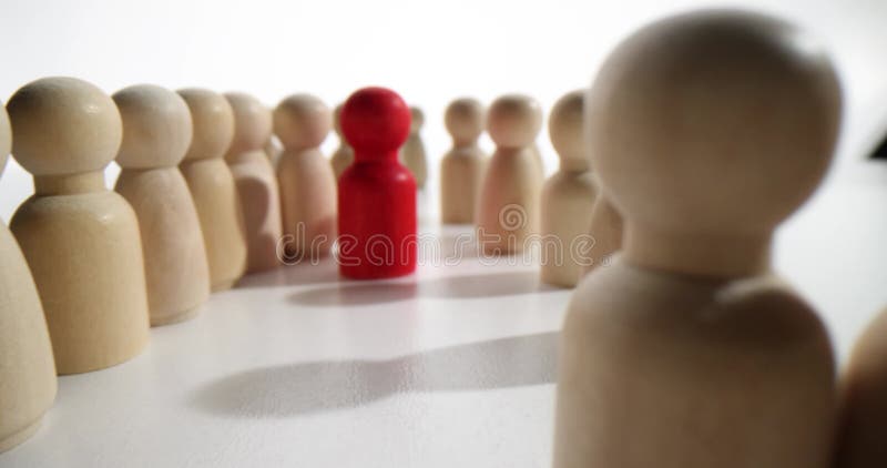 Red Figurine Stands between Long Rows of Light Figures Stock Footage ...