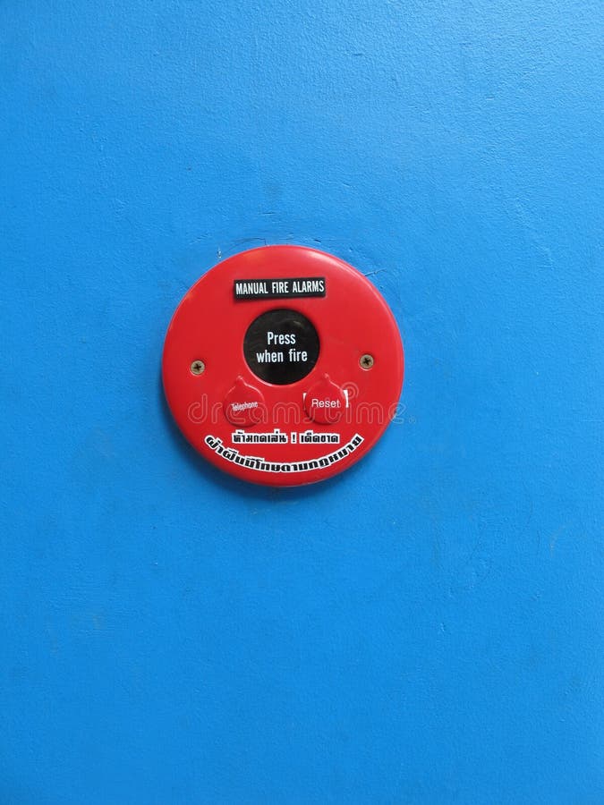 Red Fire Alarm Bell Sign On The Blue Wall Stock Photo - Image of break ...