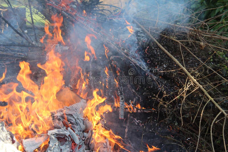 Red Fire Ash with smoke stock photo. Image of fire, smoke - 136112362