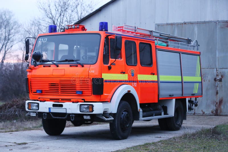 Red Fire Engine Car Parked with Emergency Ladder Stock Photo - Image of ...