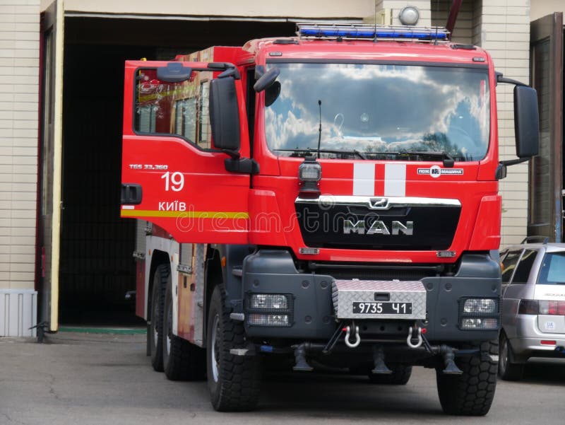 Red Fire Engines Standing at the Fire Station during the Day. Editorial ...