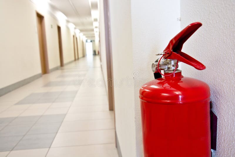 Red Fire Extinguisher in the Corridor. Stock Photo - Image of ...
