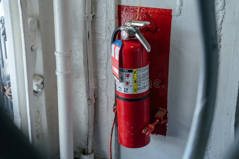 Red Fire Extinguisher Mounted on Wall Stock Photo - Image of equipment ...