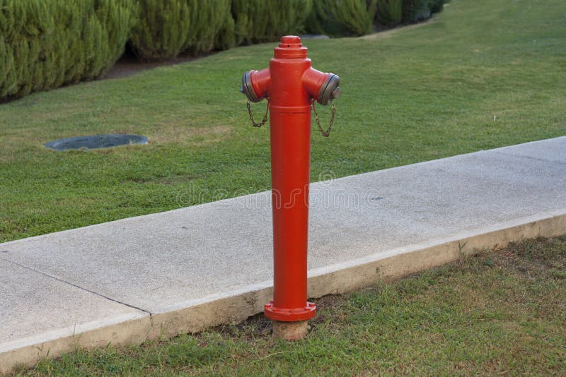 Red Fire Hydrant Against Green Lawn Photo Stock Photo - Image of danger ...