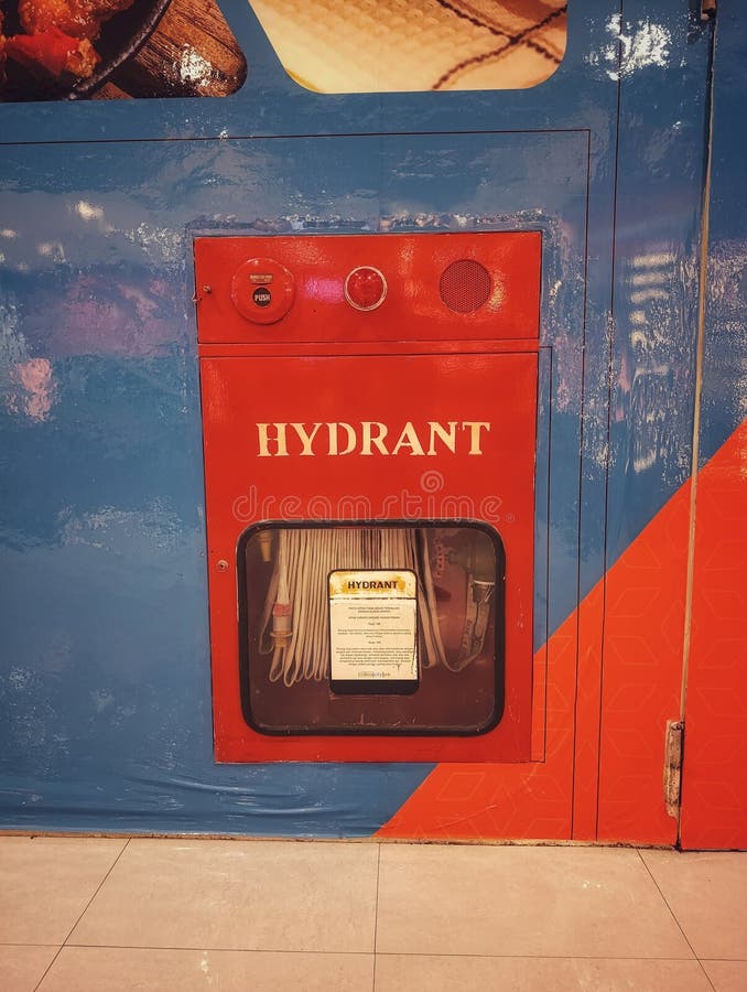 Red Fire Hydrant Box on a Wall Editorial Stock Image - Image of urban ...