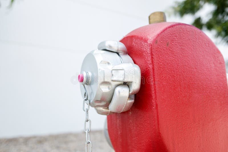 Red Fire Hydrant or Fireplug Connection for Firefighters in Public Road ...